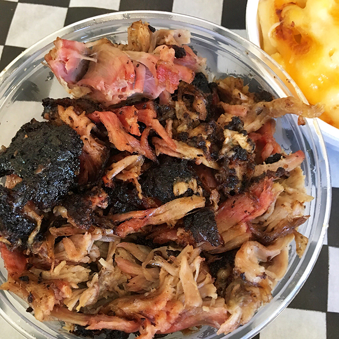 Pulled pork so tender and flavorful, it makes you wonder if the pig was massaged daily and fed only gourmet acorns.