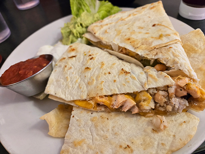 A quesadilla that doesn't merely occupy space on a plate&mdash;it commands attention with melty cheese and perfectly seasoned filling.