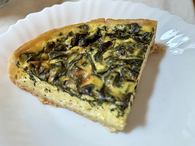 This spinach quiche isn't just breakfast—it's what Popeye would eat if he vacationed in Provence.