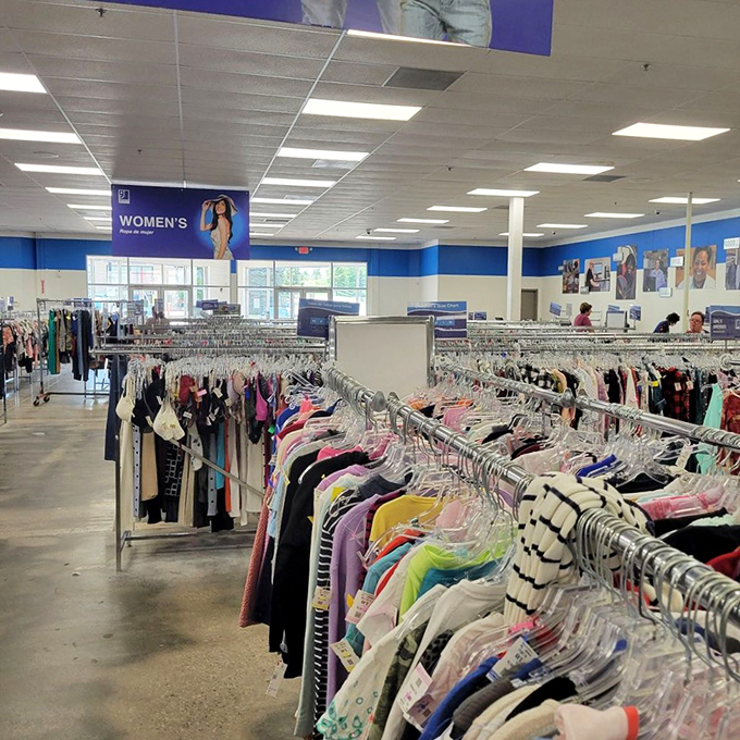 The women's section stretches to the horizon like a textile Grand Canyon, each rack a different geological layer of fashion history.