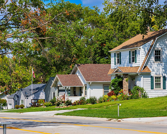 These aren't just houses; they're homes where porch swings still creak, neighbors know your name, and Halloween means full-sized candy bars.