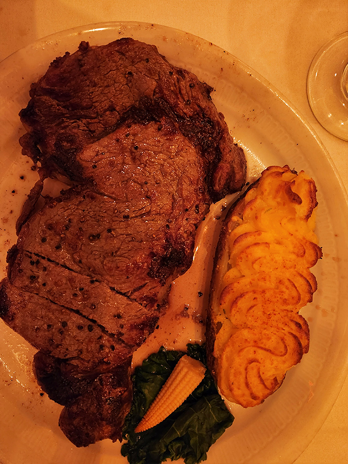 A steak so perfectly seared it could make a vegetarian weep, served alongside duchess potatoes that look like they're dressed for the opera.