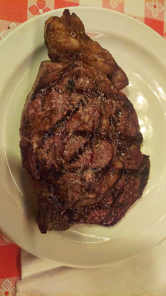 This ribeye isn't just dinner, it's a commitment. The marbling and char suggest a relationship with fire that borders on the spiritual.