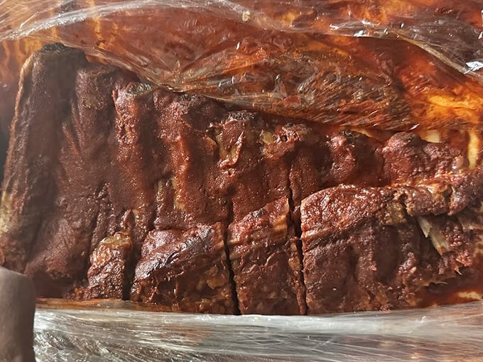 These ribs have the kind of bark that makes tree bark jealous &ndash; a glistening, mahogany masterpiece that's the result of patience, not pretension.