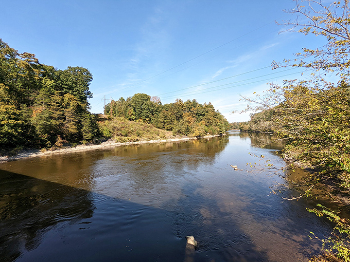 The Wallkill River flows serenely beneath, the same waters that have reflected this structure for over two centuries.