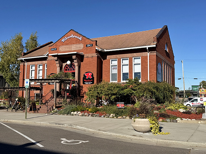Riverbrook Bike & Ski occupies a handsome brick building that's seen more seasonal transformations than a Hollywood actor preparing for an Oscar role.