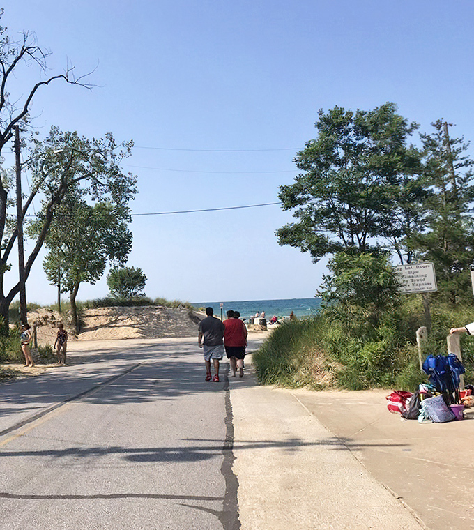 The path to paradise isn't always marked with signs. Sometimes it's just a humble trail between dune grasses.