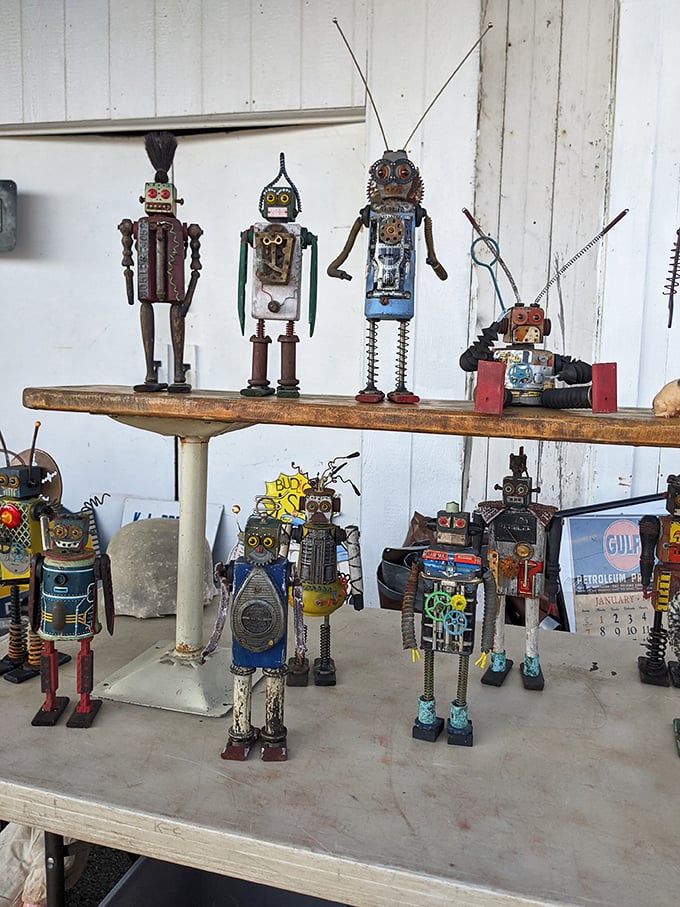 Whimsical metal robots crafted from recycled parts prove that one person's junk becomes another's conversation-starting yard art.