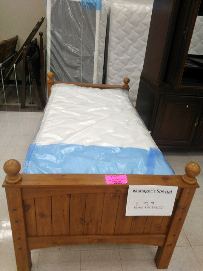 A rustic twin bed frame with character to spare—perfect for that guest room makeover or child's first "big kid" bed. Solid wood craftsmanship at fast-furniture prices.