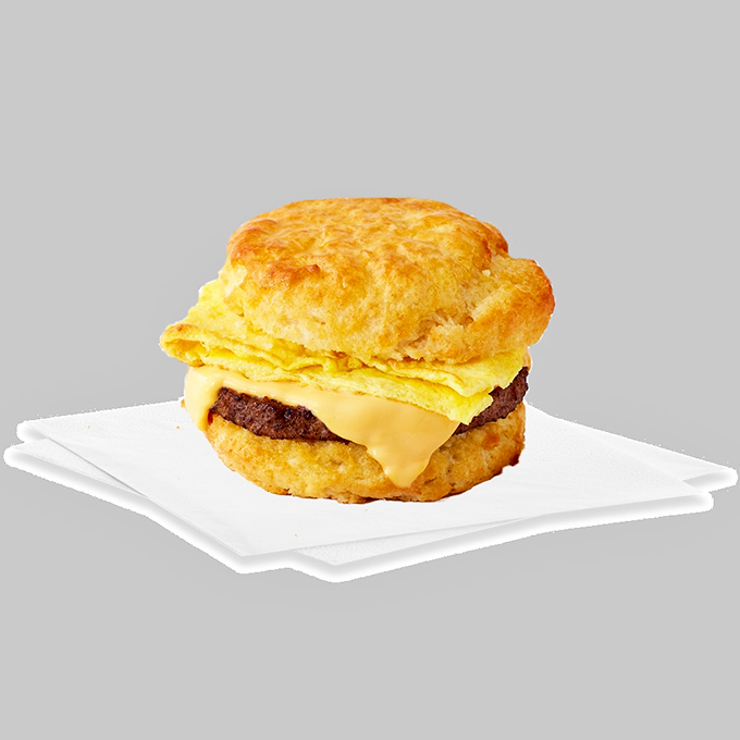 Breakfast alchemy at its finest &ndash; a golden biscuit embracing sausage, egg and cheese in a handheld miracle that makes mornings bearable again.