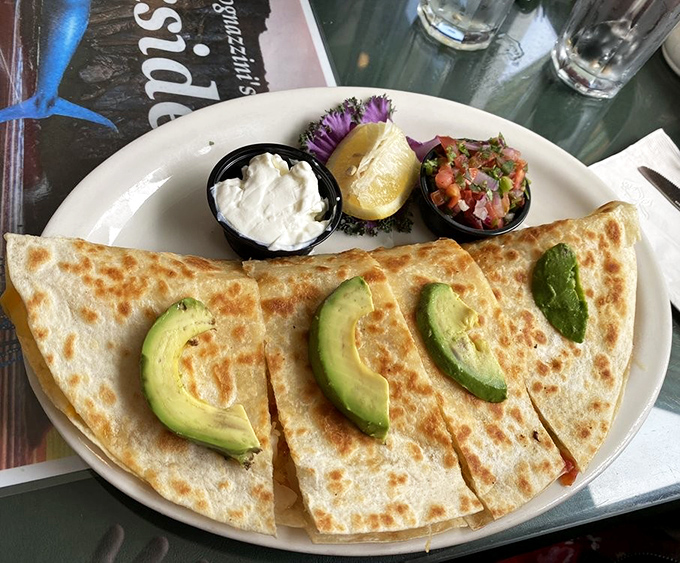 Quesadillas get the coastal California treatment with fresh avocado and pico de gallo. It's what happens when Mexican classics vacation in Morro Bay.