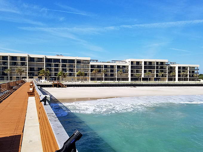 Low-rise beachfront living that won't require liquidating your 401(k). The palm trees come standard with every sunset.