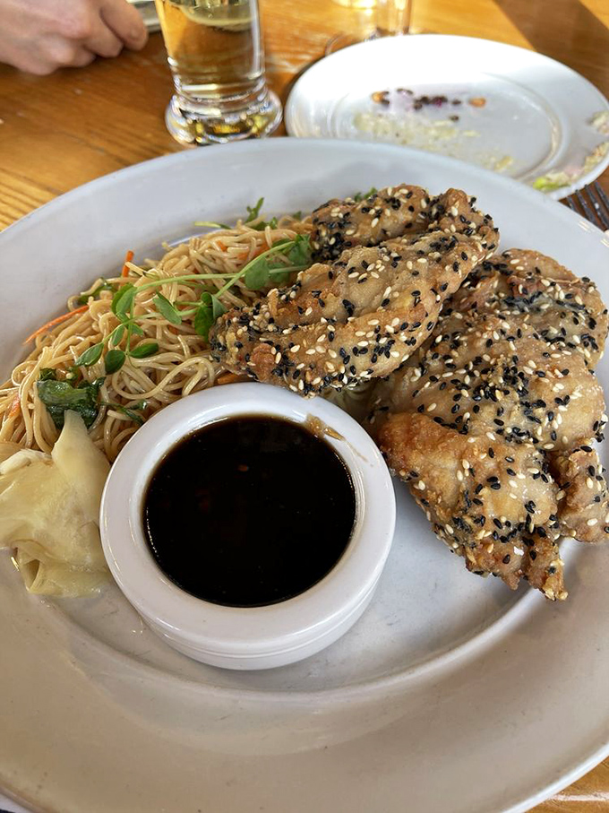 Sesame chicken that makes you wonder why you ever settled for takeout, paired with noodles that dance between sweet and savory.