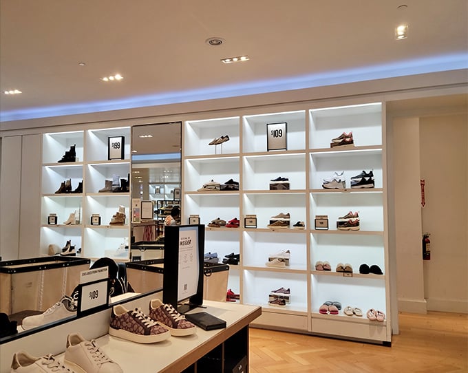 A minimalist shoe display that would make Marie Kondo weep with joy—each pair waiting to spark joy without sparking credit card debt.