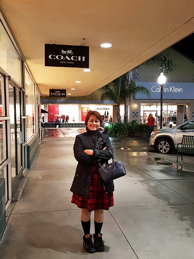 Outside Coach and Calvin Klein, shoppers experience that magical moment when luxury becomes surprisingly accessible.