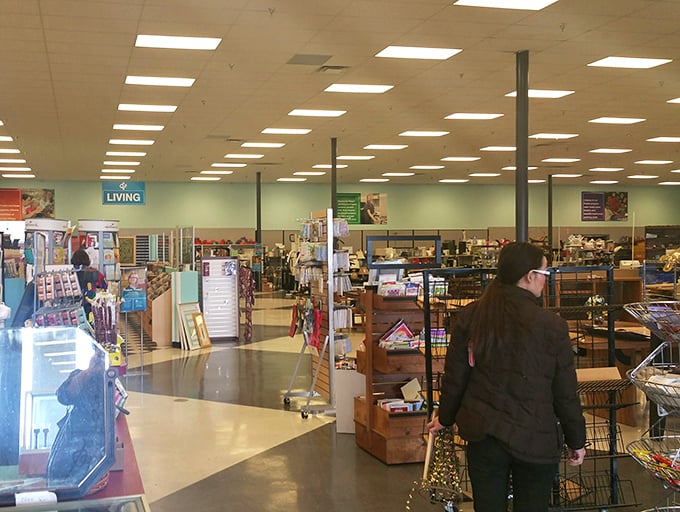 The "Living" section sign isn't just a department marker – it's a philosophy for transforming pre-loved items into the heart of your home.