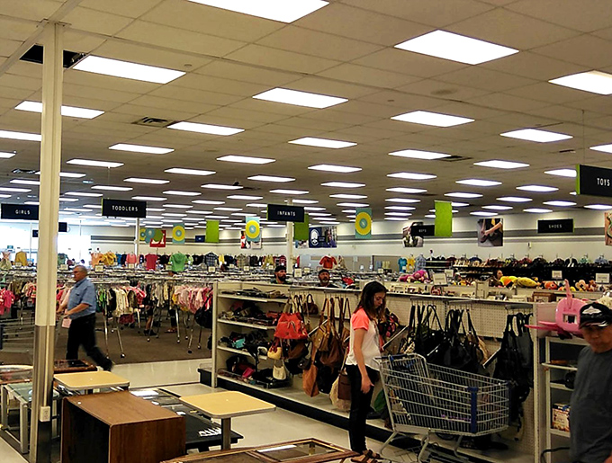 Colorful overhead decorations guide shoppers through departments like cheerful breadcrumbs leading to your next great find.