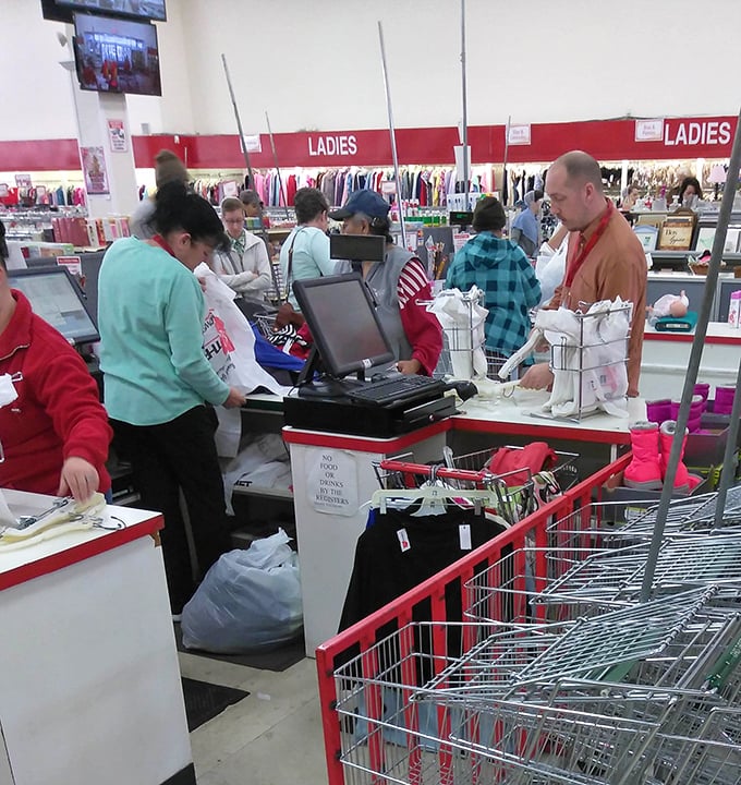 The checkout line: where strangers become comrades united by the universal language of "Look what I found for only..."