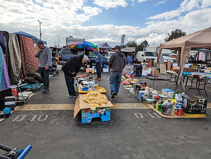 The thrill of the hunt in action&mdash;shoppers navigate the market's impromptu alleyways like seasoned explorers on the trail of their next great find.