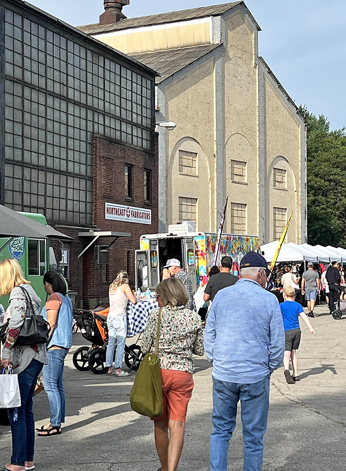 The modern town square: Youngstown Flea draws diverse crowds seeking everything from food trucks to handcrafted treasures outside the historic Northeast Fabricators building.