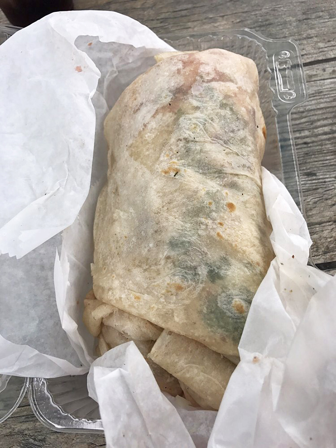 This burrito isn't just a meal, it's an event. Wrapped tight like a culinary present, with fries playing the supporting role they were born for.