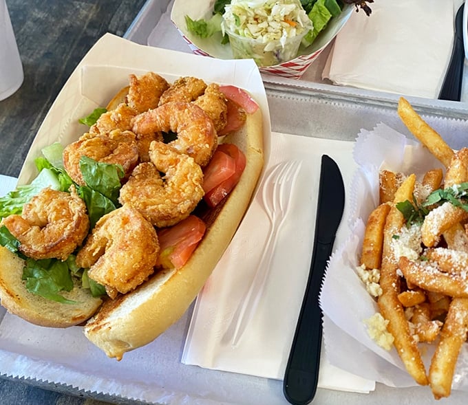 Golden fried shrimp piled high on a bun &ndash; this isn't a sandwich, it's a delicious architectural achievement.