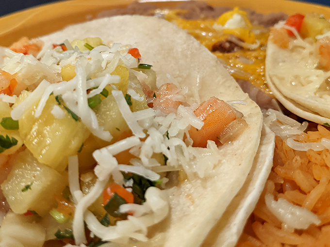 These shrimp tacos aren't just a meal; they're a beach vacation for your mouth, complete with fresh pineapple salsa and a sprinkle of paradise.