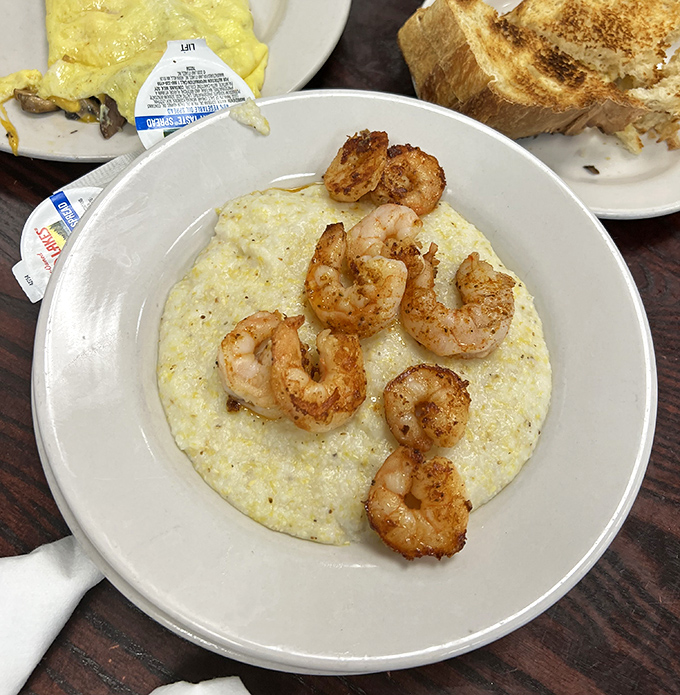 Shrimp and grits so creamy and perfectly seasoned, they'll make you understand why the Lowcountry takes this dish seriously.