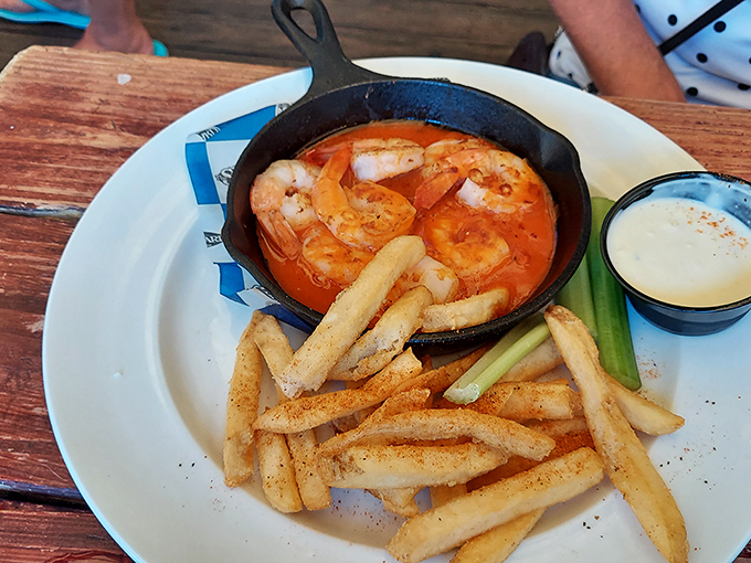 Shrimp swimming in spicy goodness, served in a skillet that's seen more action than a beach volleyball court.