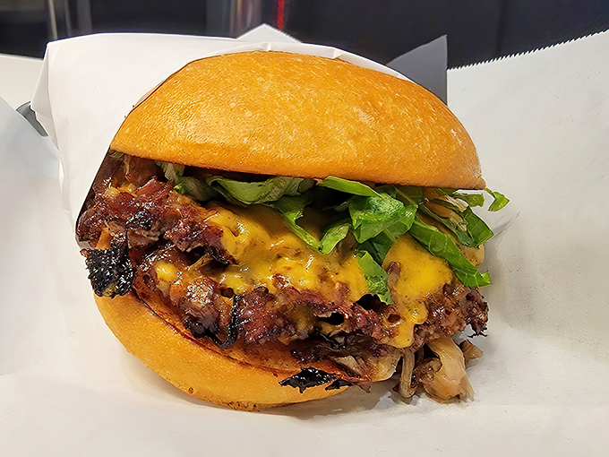 The smash burger, where beef meets griddle in a beautiful dance of caramelization. That cheese melt should have its own Instagram account.