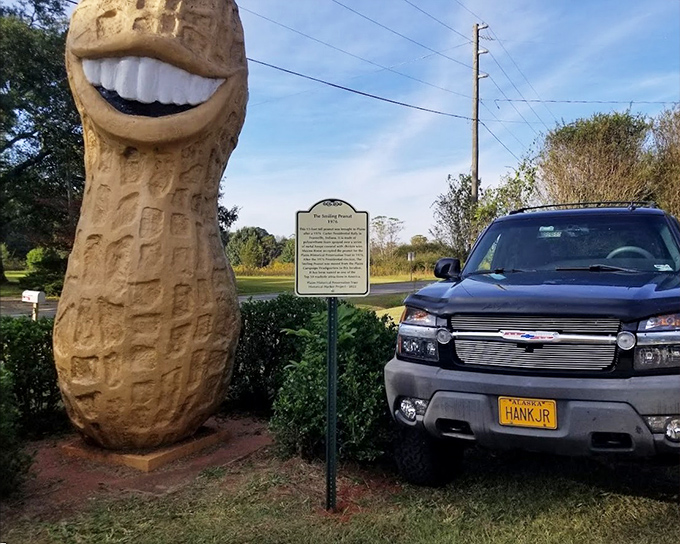 The peanut towers over a pickup truck, reminding visitors that everything really is bigger in small-town America.