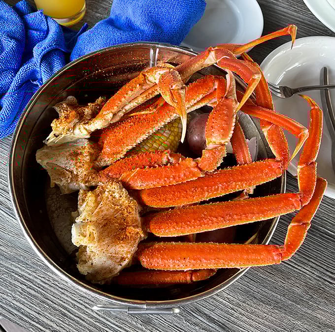 Snow crab legs arranged like nature's perfect puzzle—crack, dip, savor, repeat until blissfully satisfied.