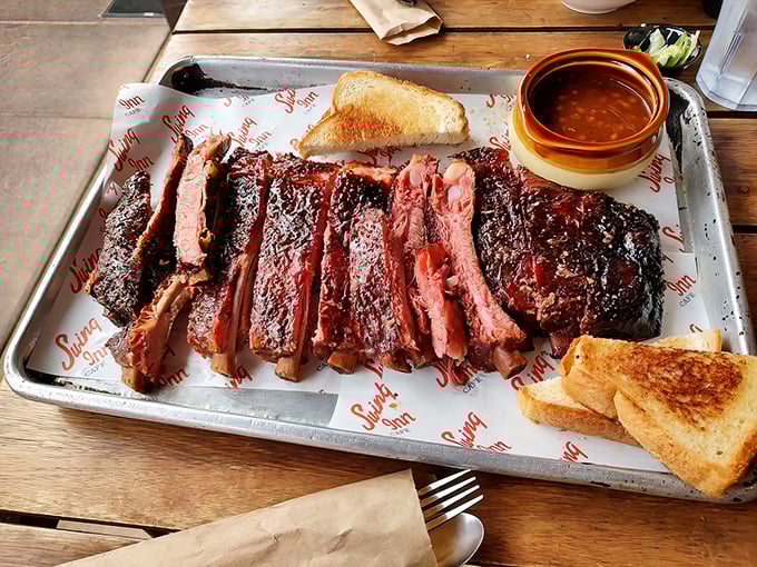 These ribs aren't just fall-off-the-bone tender; they've already packed their bags, left home, and started a new life on your plate.