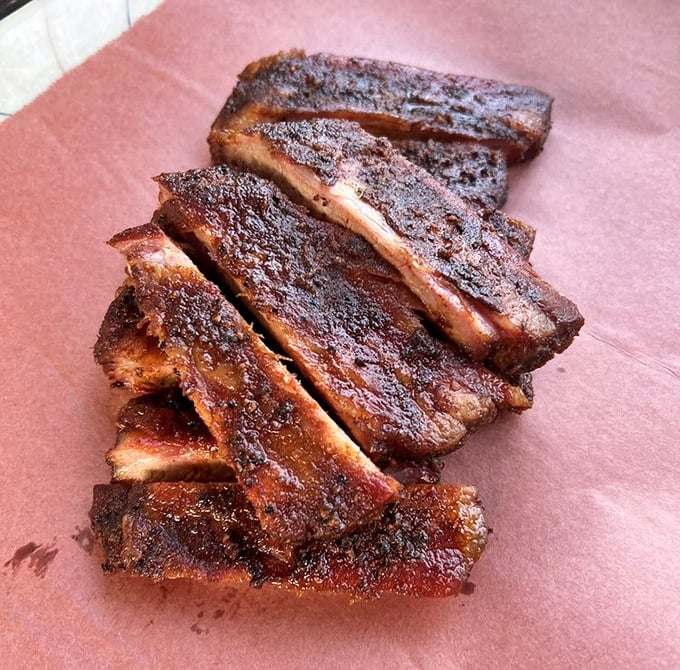 These spare ribs don't play games – they're serious business with that perfect bark. The kind of ribs that make you forget napkins exist and dignity is overrated.