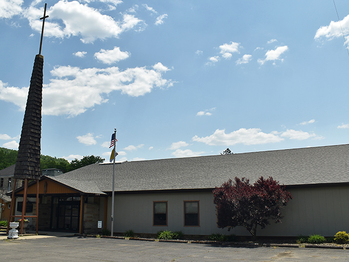 Reaching skyward like the surrounding pines, this church's unique spire serves as both spiritual landmark and conversation starter for Sunday drivers.
