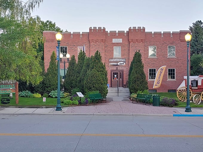 The Stagecoach Museum's castle-like facade houses treasures from Wyoming's frontier days, standing proudly as if daring modernity to challenge its brick-and-mortar permanence.