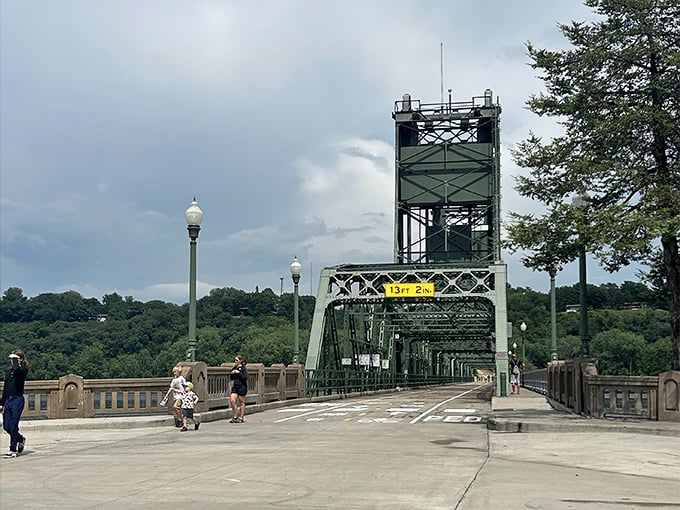 The iconic Stillwater Lift Bridge stands like a sentinel over the St. Croix, connecting Minnesota and Wisconsin with equal parts engineering and nostalgia. 