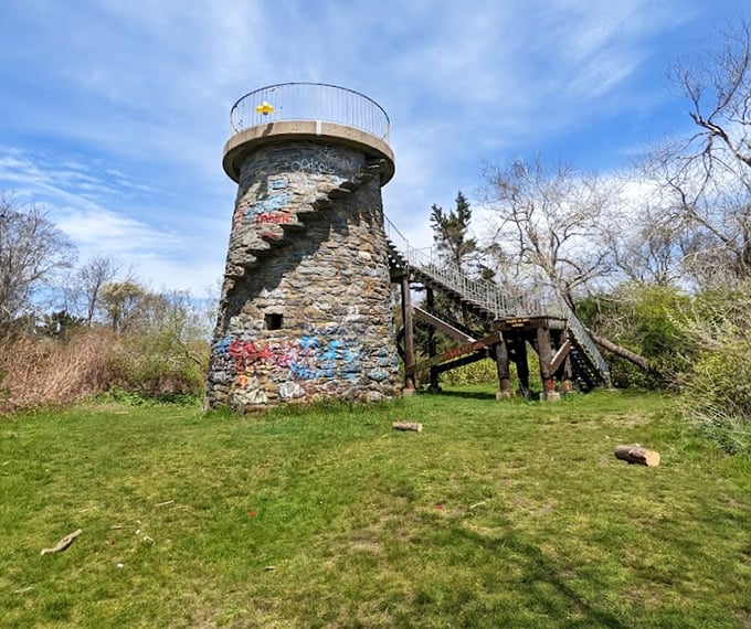 A stone sentinel standing watch. This weathered observation tower has witnessed decades of storms, sunsets, and countless visitors seeking panoramic views.