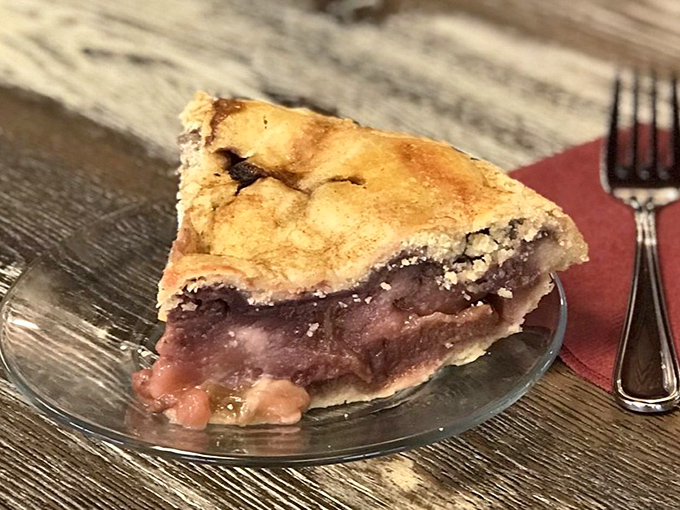 Ruby-red filling peeks through the lattice top, a sweet-tart romance between strawberry and rhubarb that's stood the test of time.