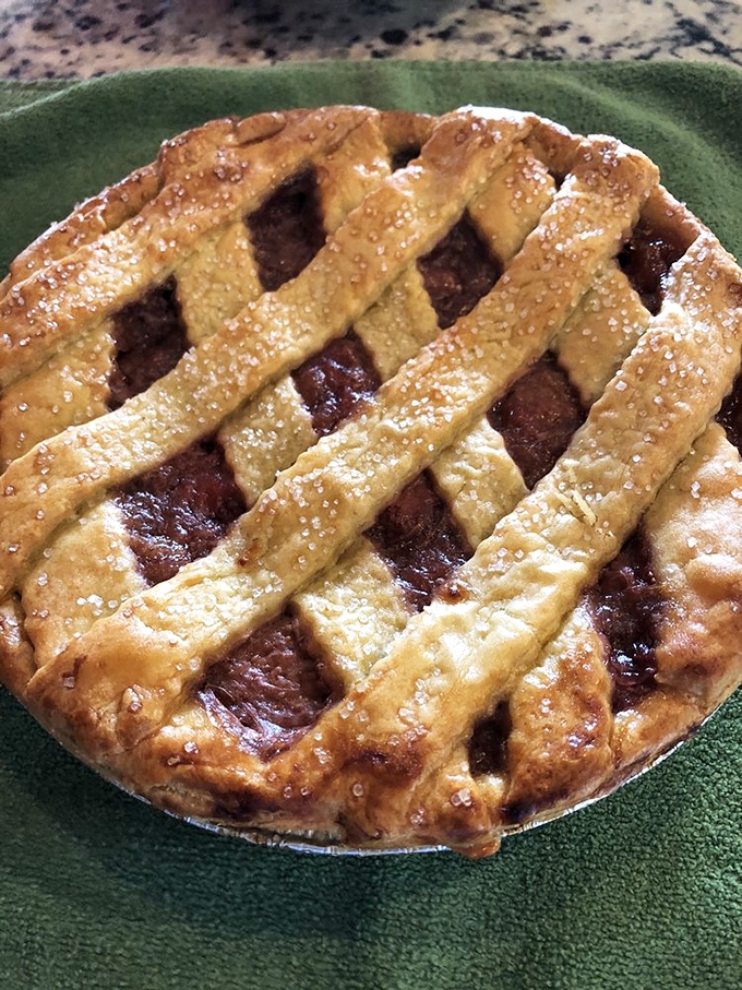 Lattice work isn't just for fences&mdash;this fruit pie's golden, buttery crust weaves a perfect home for the sweet-tart filling beneath.