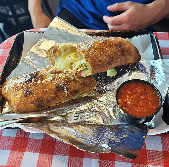 The stromboli at Uncle Rico's doesn't just ooze cheese &ndash; it performs a full melt-down spectacular that would make any food photographer weep with joy.