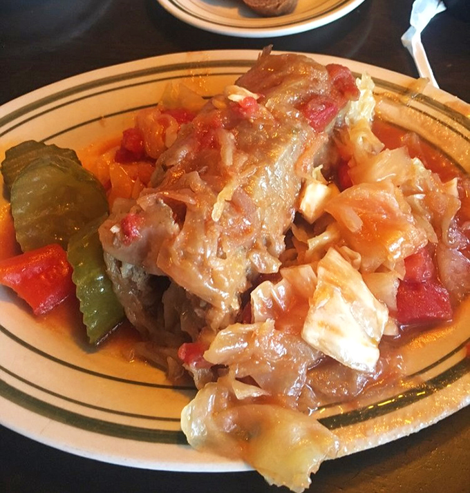 Stuffed cabbage that would make any grandmother proud. Tender cabbage leaves embrace a savory filling of meat, rice, and spices in this Hungarian classic.
