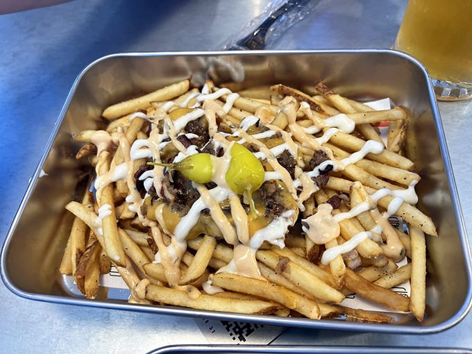 Dirty Tallow Fries: where potatoes fulfill their highest purpose. Beef fat-fried and loaded with toppings, these aren't fries&mdash;they're a religious experience.