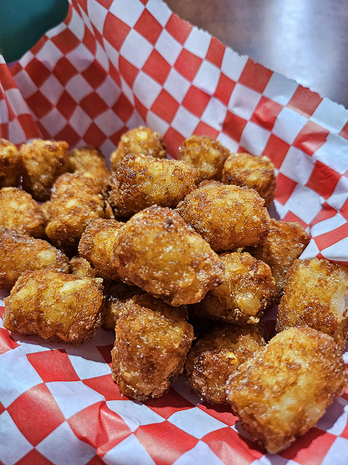 Golden-brown tater tots that crunch like childhood memories. These crispy potato nuggets are what French fries dream of becoming when they grow up.