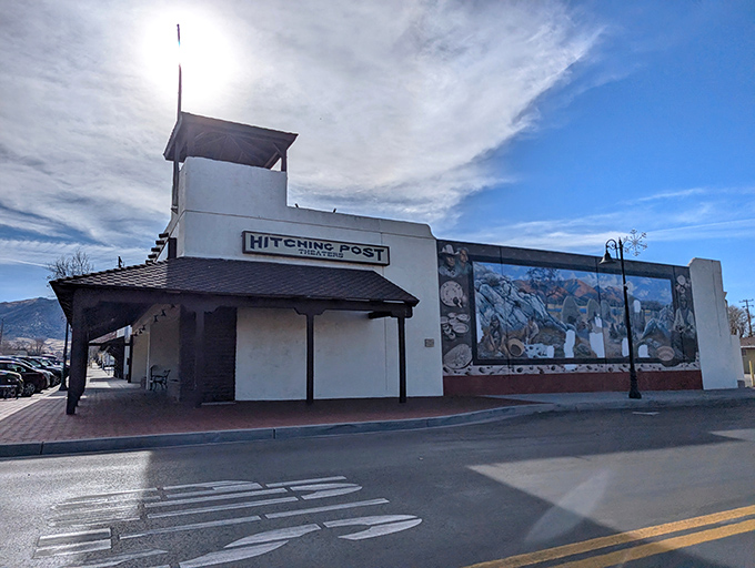The Hitching Post Theater's vibrant mural tells stories of the Old West, while inside, new memories are made daily.