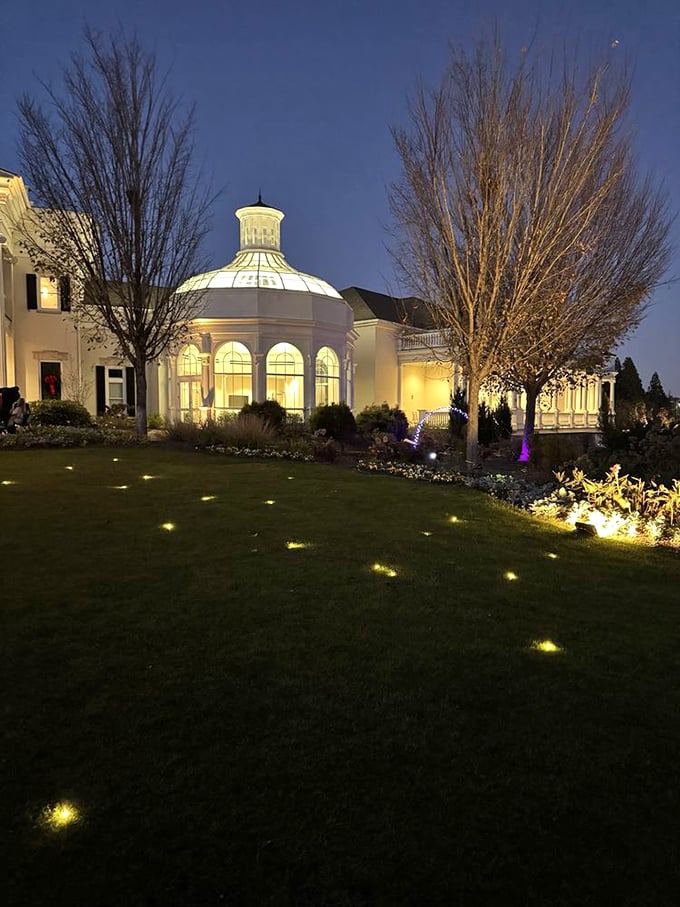 The elegant pavilion glows at dusk like a Southern belle dressed for a formal garden party. Even the trees stand a little straighter in its presence.