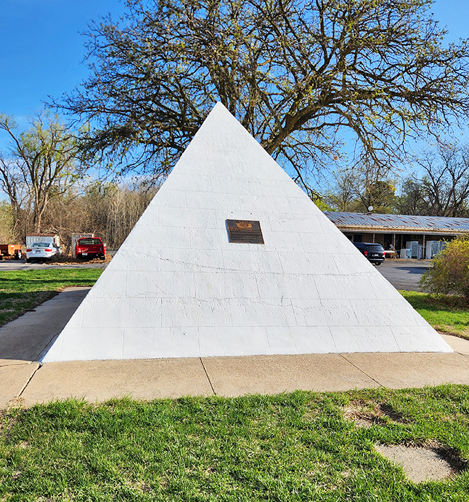 The perfect pyramid backdrop for family photos &ndash; because nothing says "vacation memories" like concrete geometry.