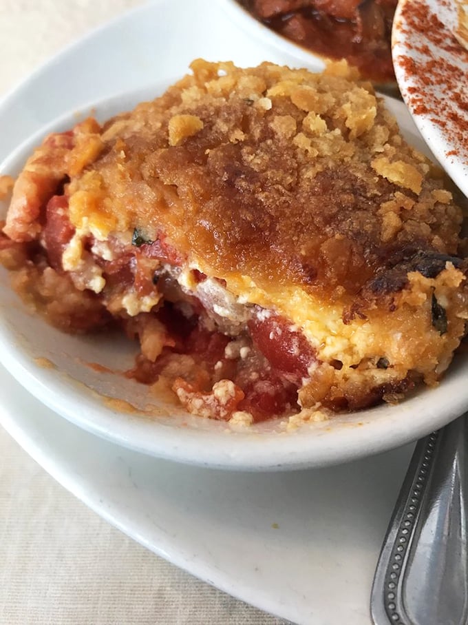 Not just tomato casserole&mdash;it's Southern sunshine in a ramekin, topped with a crumbly crown worthy of Georgia royalty.