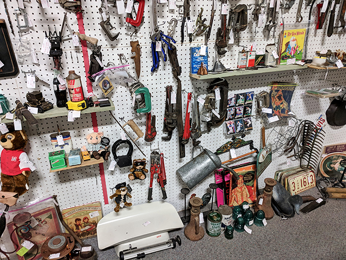 Tools that built America, hanging like historical artifacts in a museum of practical ingenuity. That monkey wrench has stories to tell.
