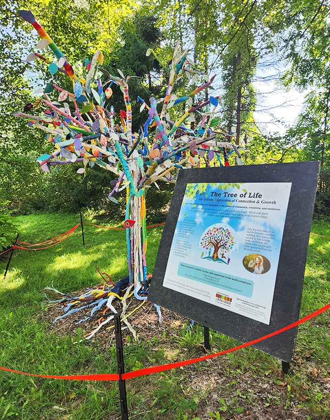 The "Tree of Life" art installation proves that community creativity blooms just as beautifully as any garden. Each colorful tag represents a personal story.